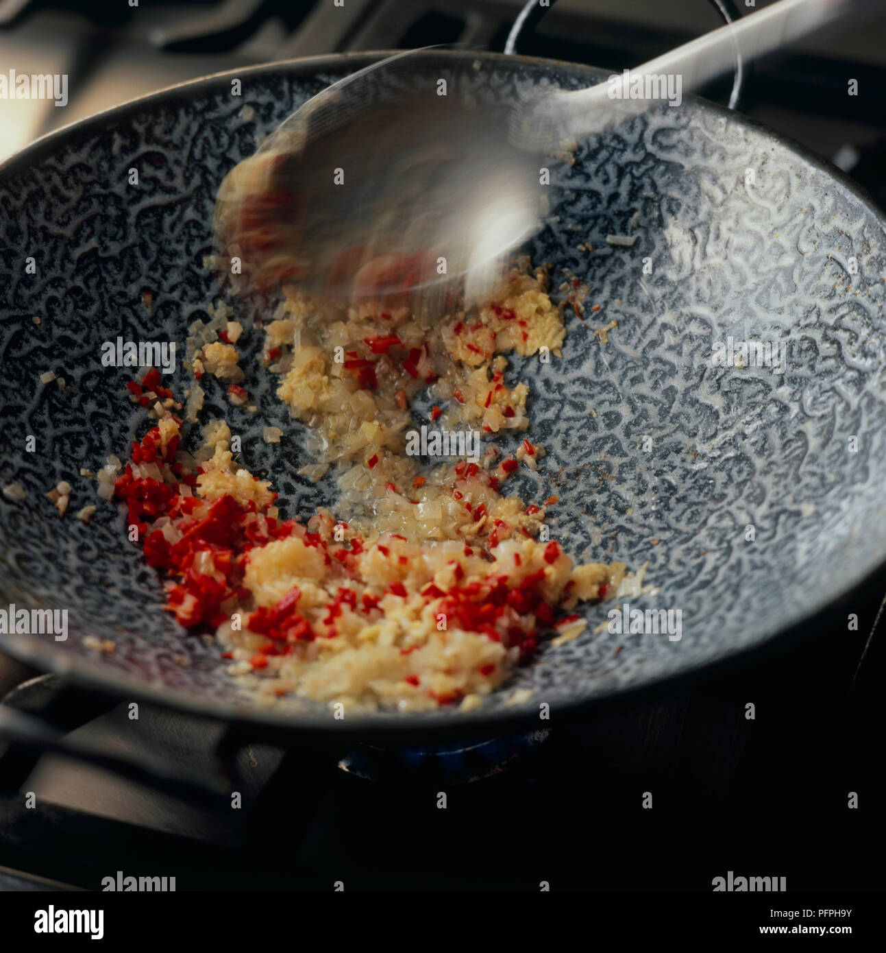 Gas hob wok hi-res stock photography and images - Alamy