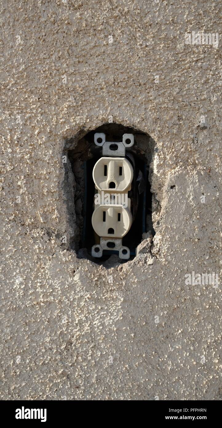 Unprotected wall outlet hi-res stock photography and images - Alamy