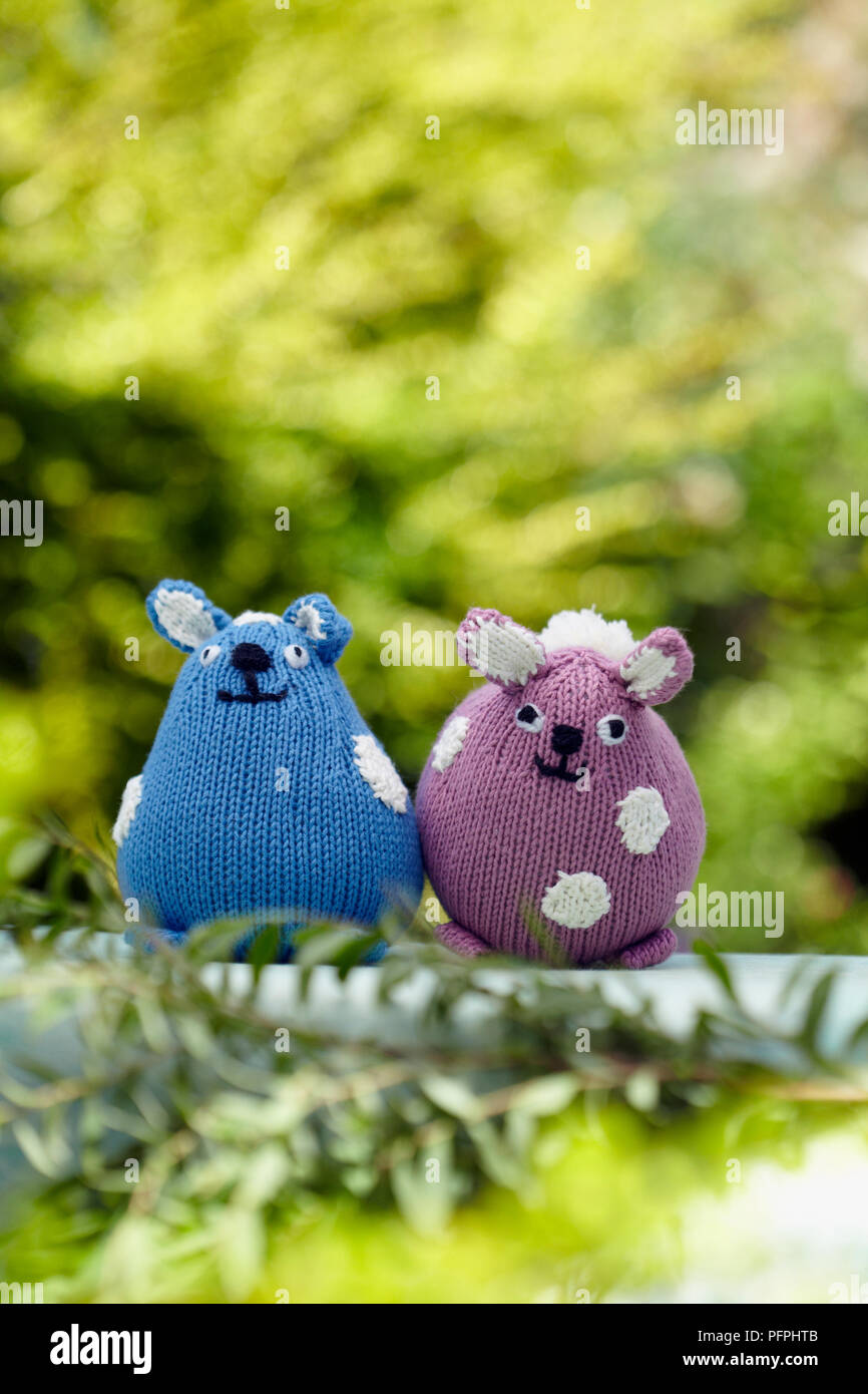 Knitted rabbits, front view Stock Photo - Alamy