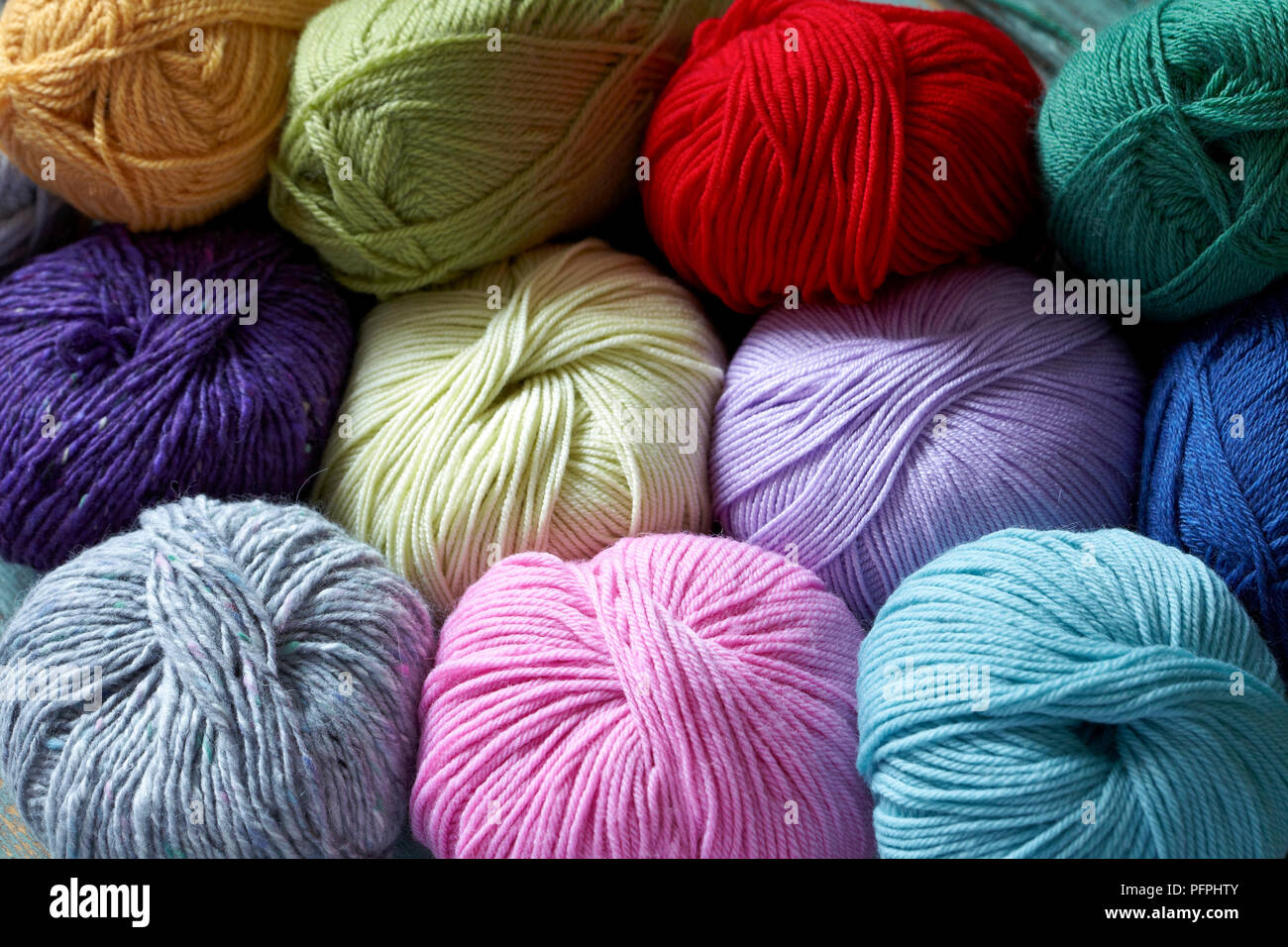 Pile of colourful balls of wool, close-up Stock Photo - Alamy