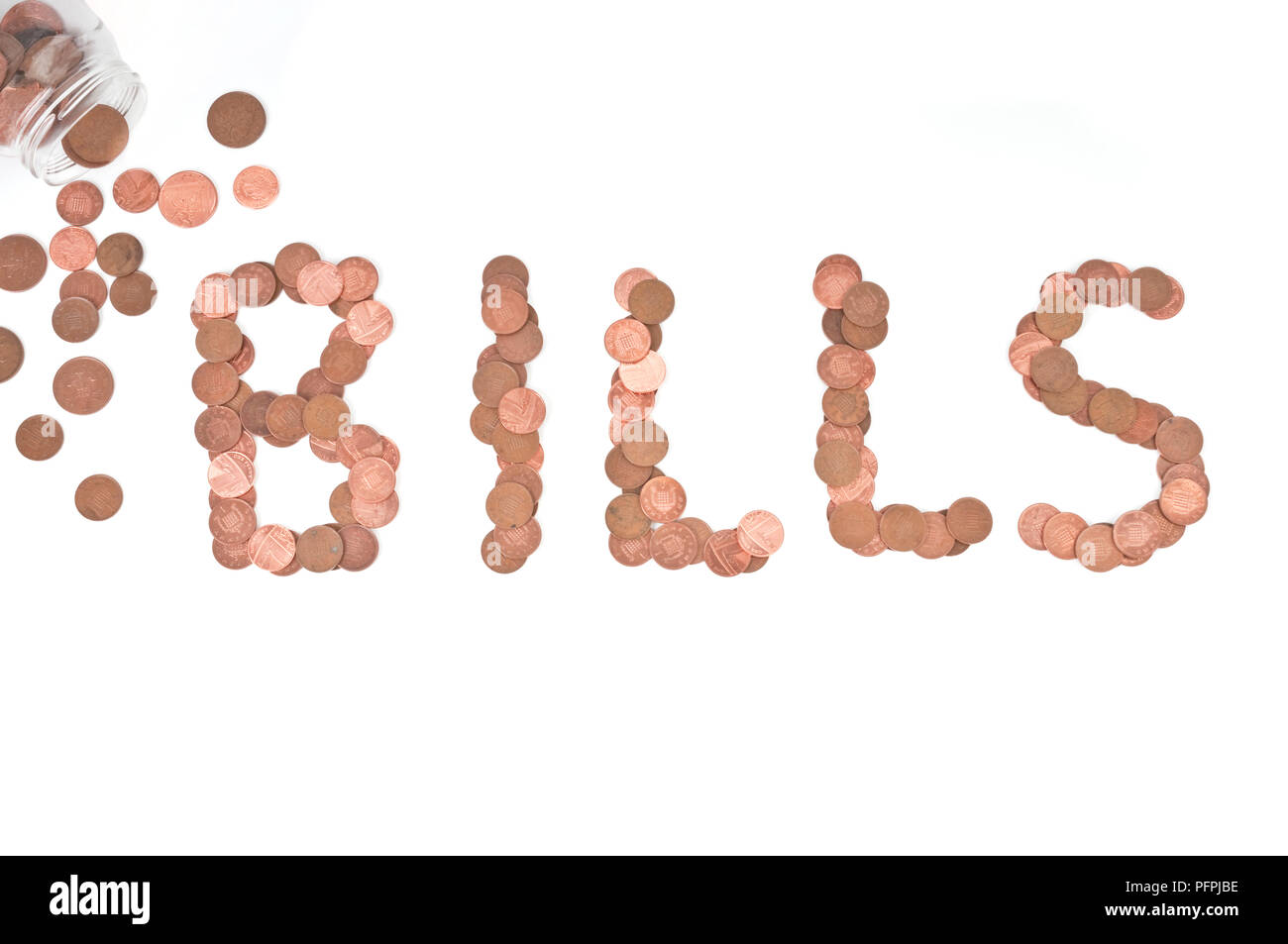 Coins arranged to form the word 'bills' Stock Photo - Alamy