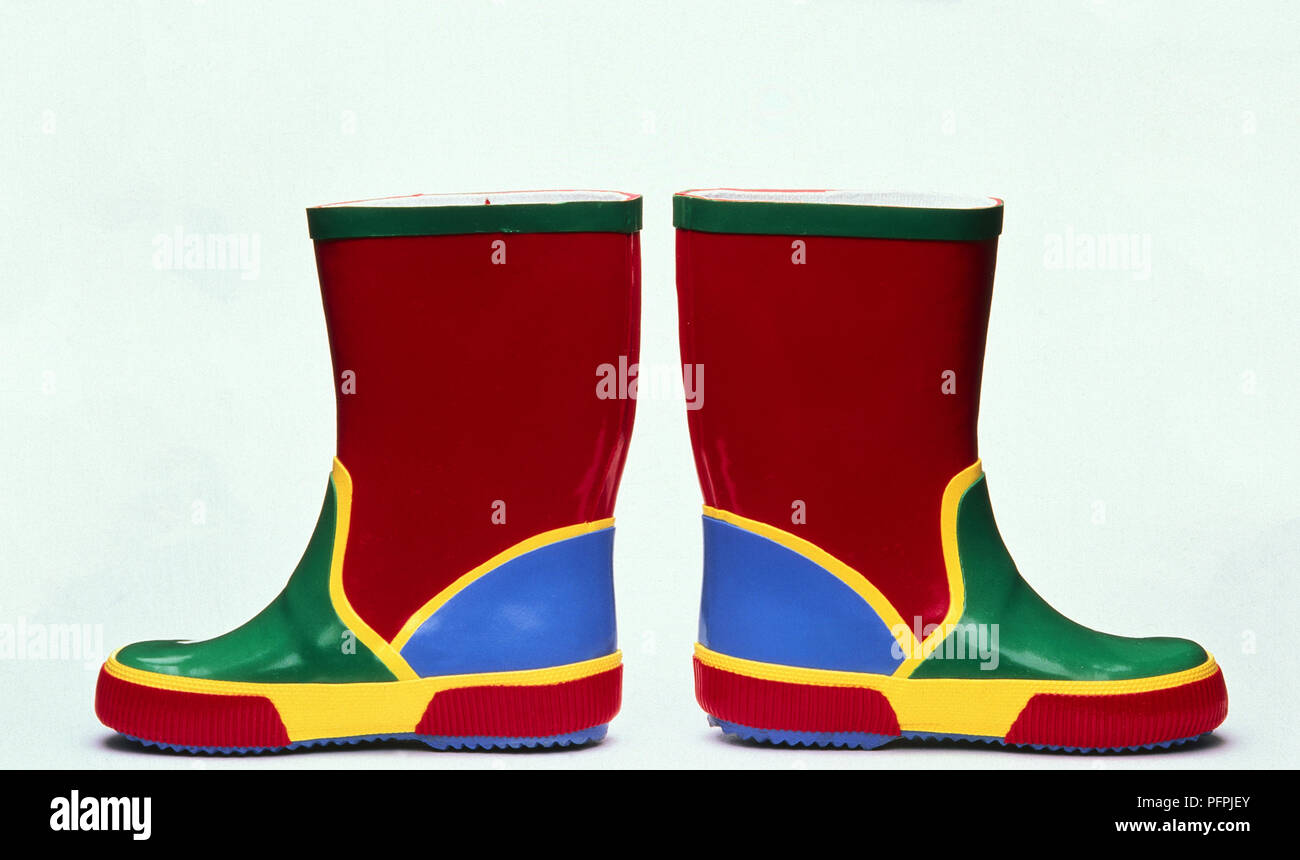 Pair of multi-coloured rubber boots Stock Photo - Alamy
