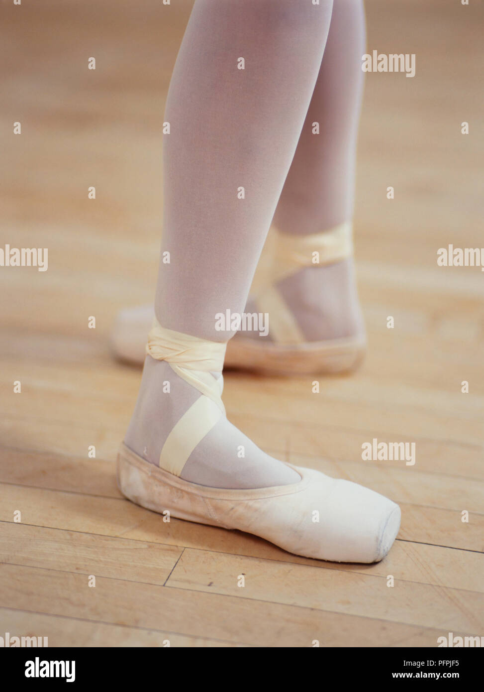 Ballet dancers feet in fourth position Stock Photo - Alamy