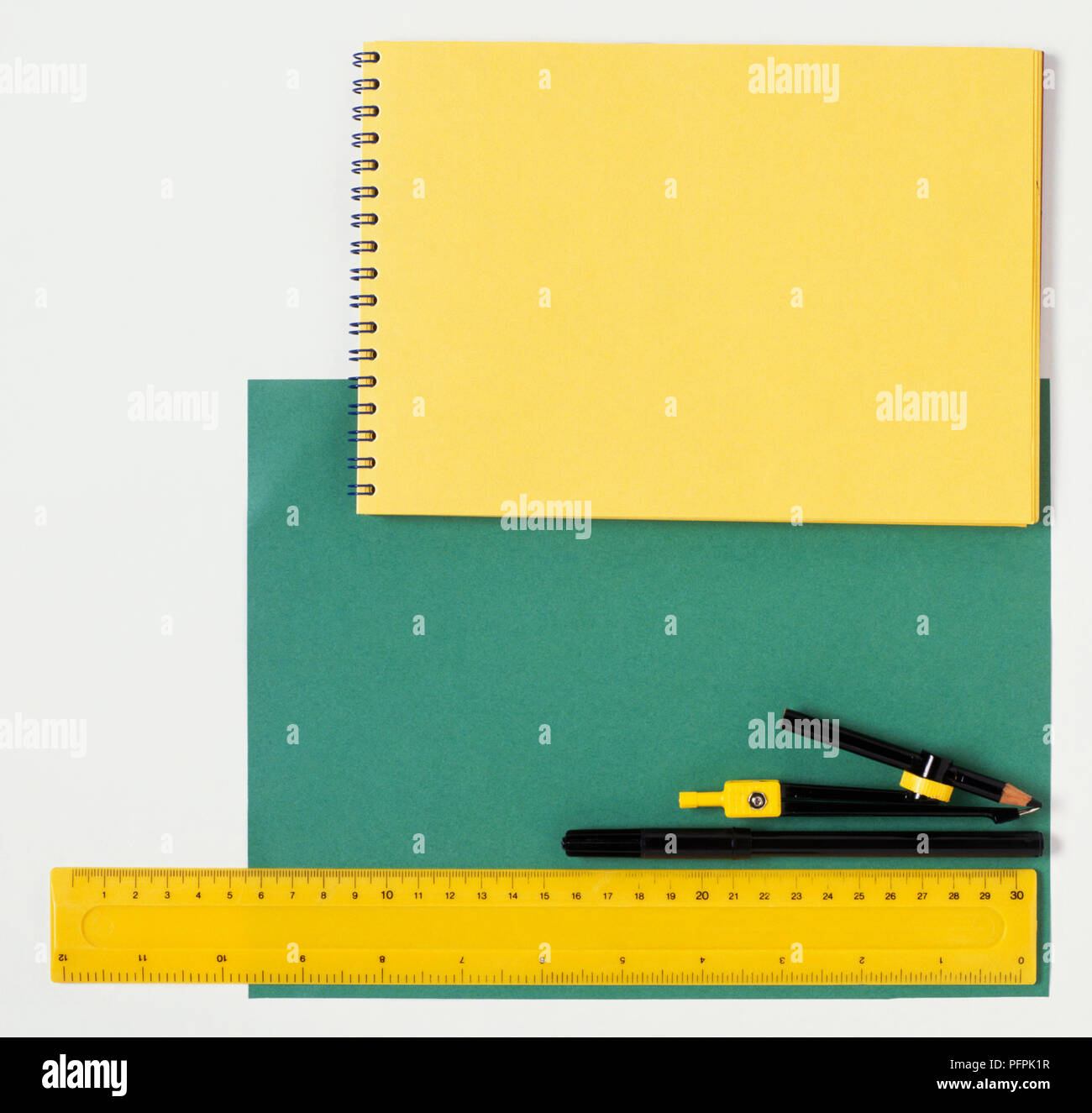 Plastic ruler, pen, pair of compasses, notepad, coloured paper Stock ...