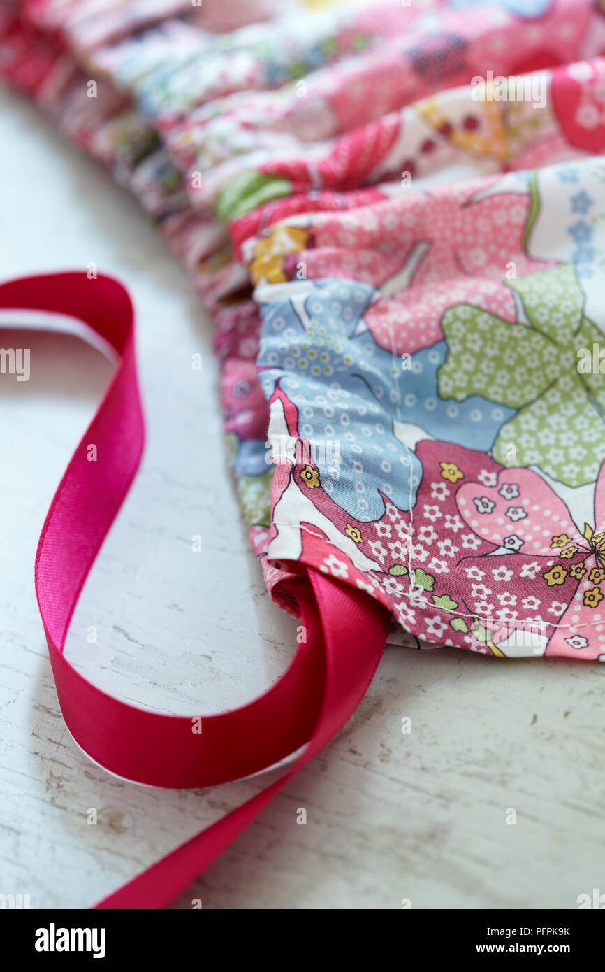 Ribbon threaded through girl's summer dress (ribbon dress Stock Photo ...