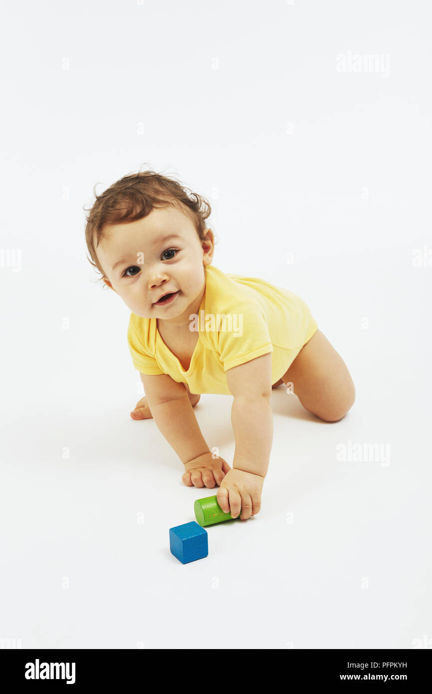 Baby holding front hi-res stock photography and images - Alamy