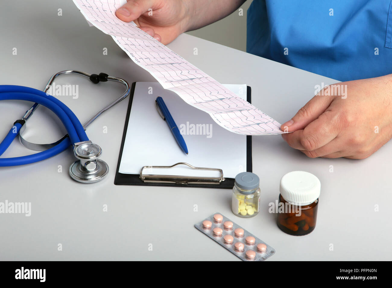 Close up doctors hands holding pen hi-res stock photography and images ...