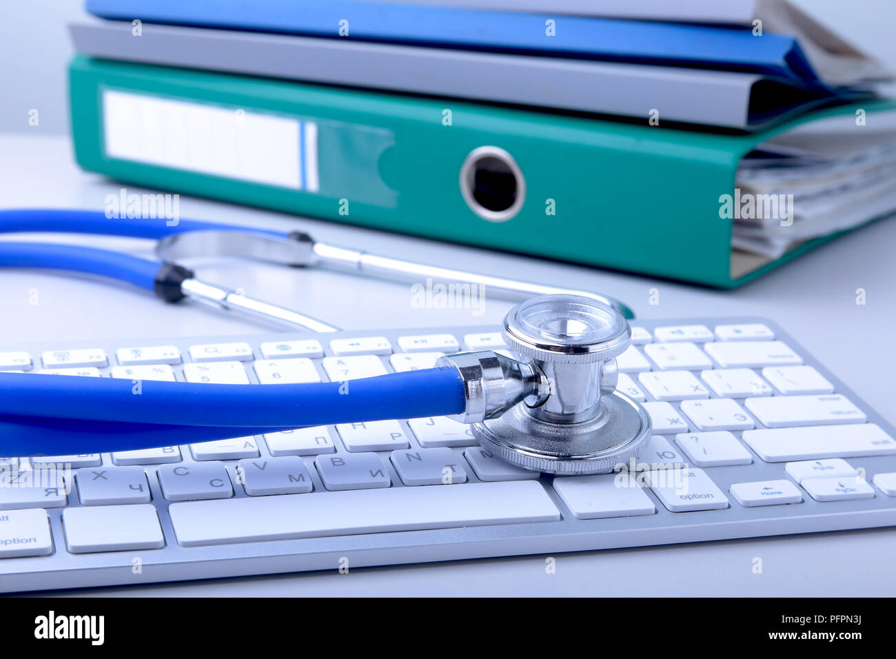 books folder file, stethoscope and laptop, keyboard isolated on white ...