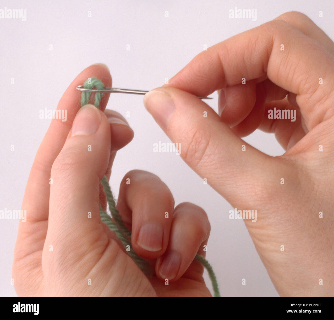 Threading Through A Needle High Resolution Stock Photography and Images ...