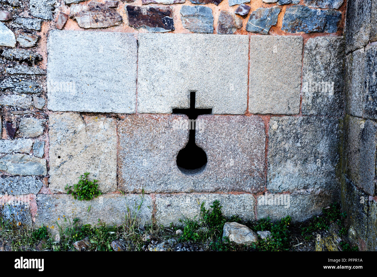 Fine example of an arrowslit with a horizontal slit creating a cross ...
