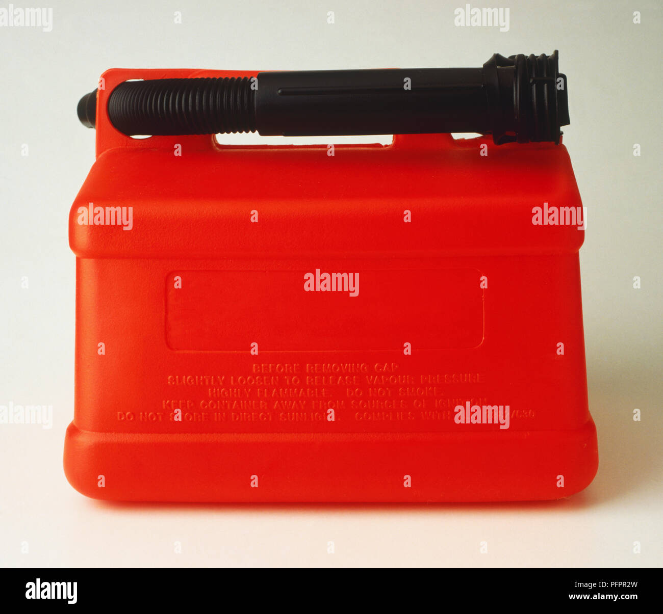 Red petrol can Stock Photo - Alamy