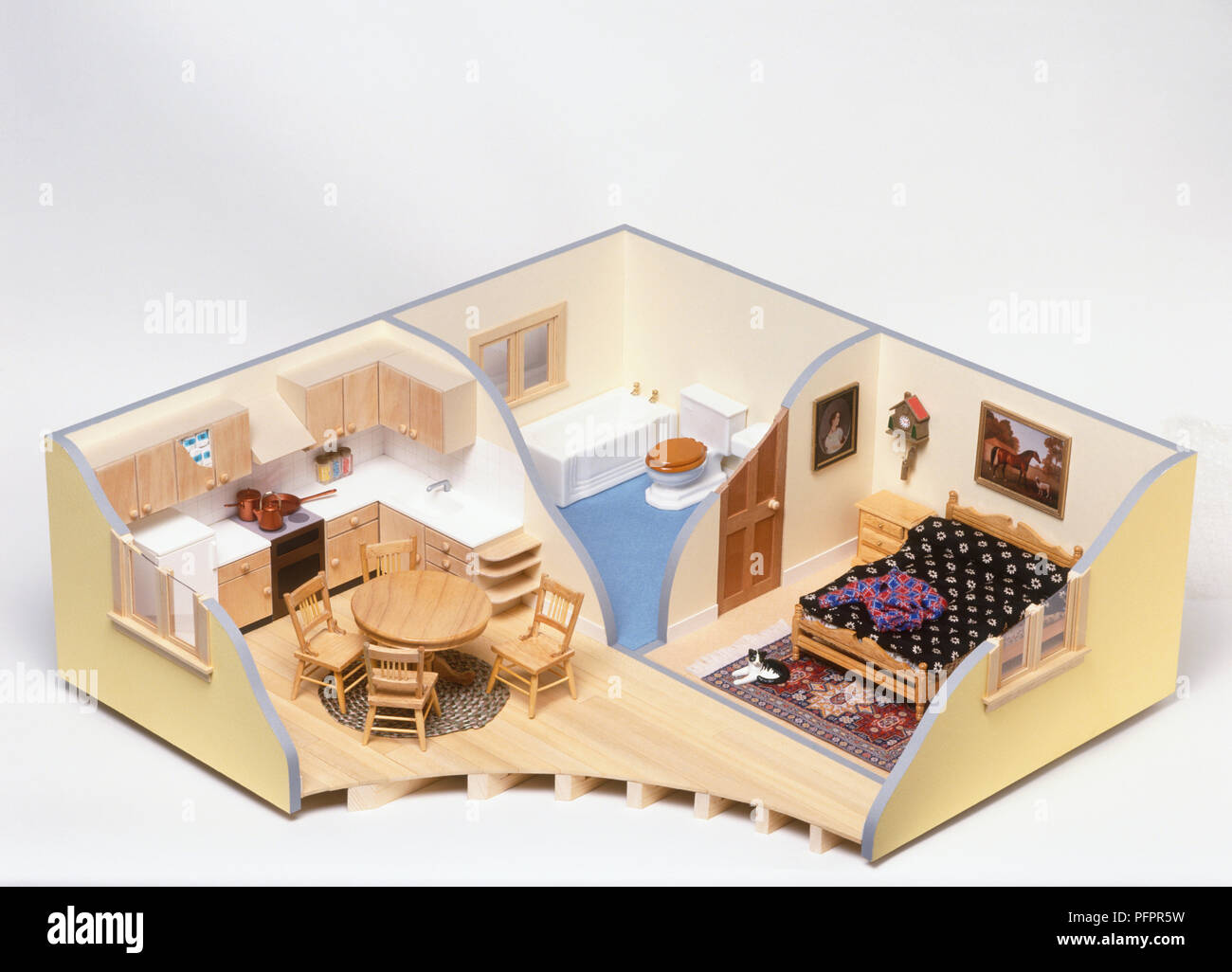 Model of ground floor layout of flat with cutaway view of bedroom ...