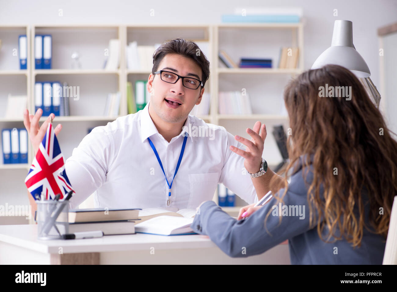 English language training with teacher and student Stock Photo - Alamy