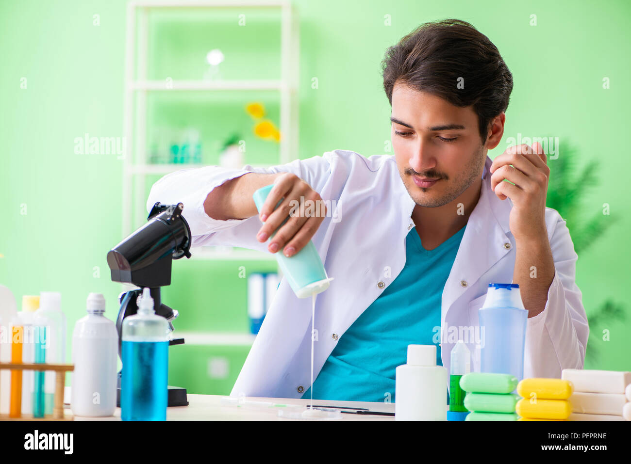 Chemist testing soap in the lab Stock Photo - Alamy