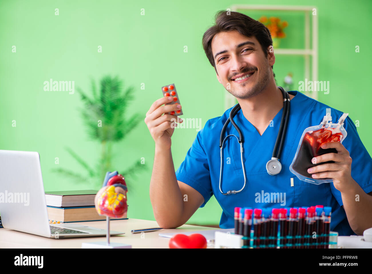 Doctor doing blood analysis in the lab Stock Photo - Alamy