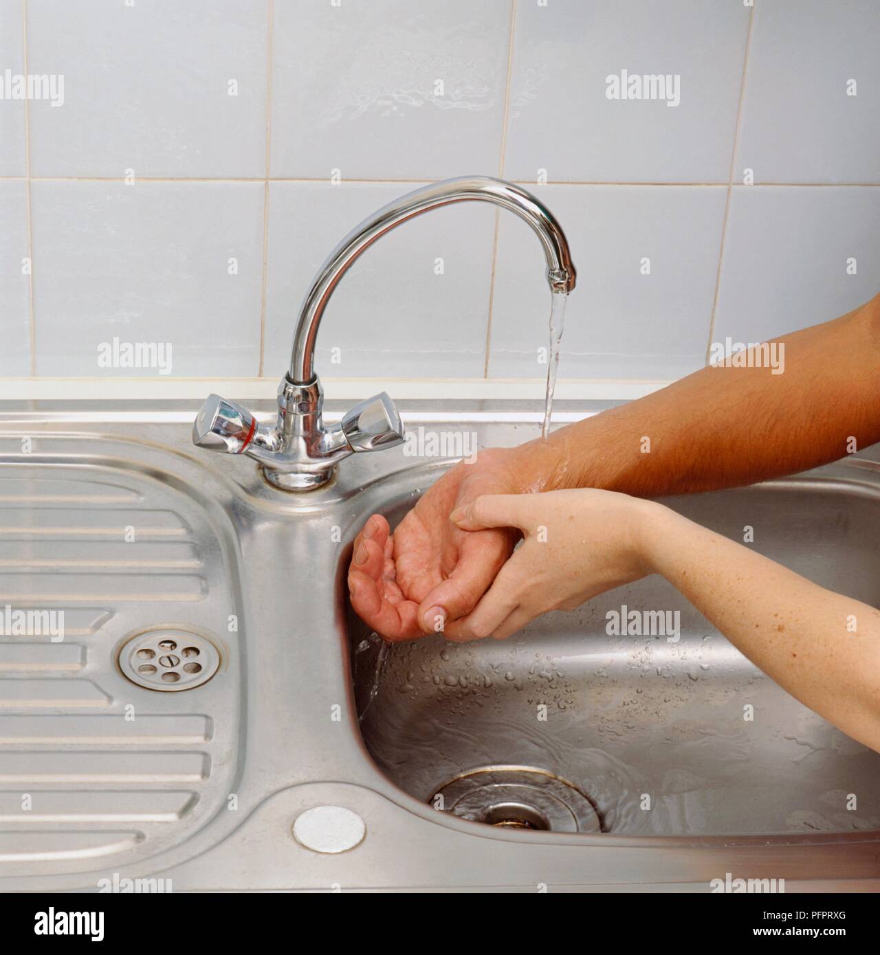 Wound arm cleaning hi-res stock photography and images - Alamy