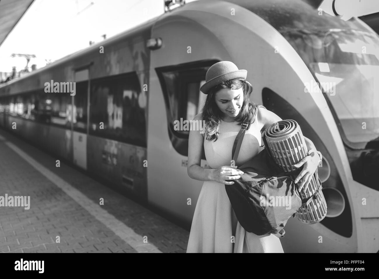 Young woman tourist searching Black and White Stock Photos & Images - Alamy