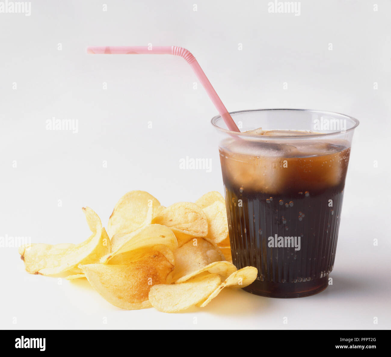 Glass of Cola and Potato Crisps Stock Photo - Alamy