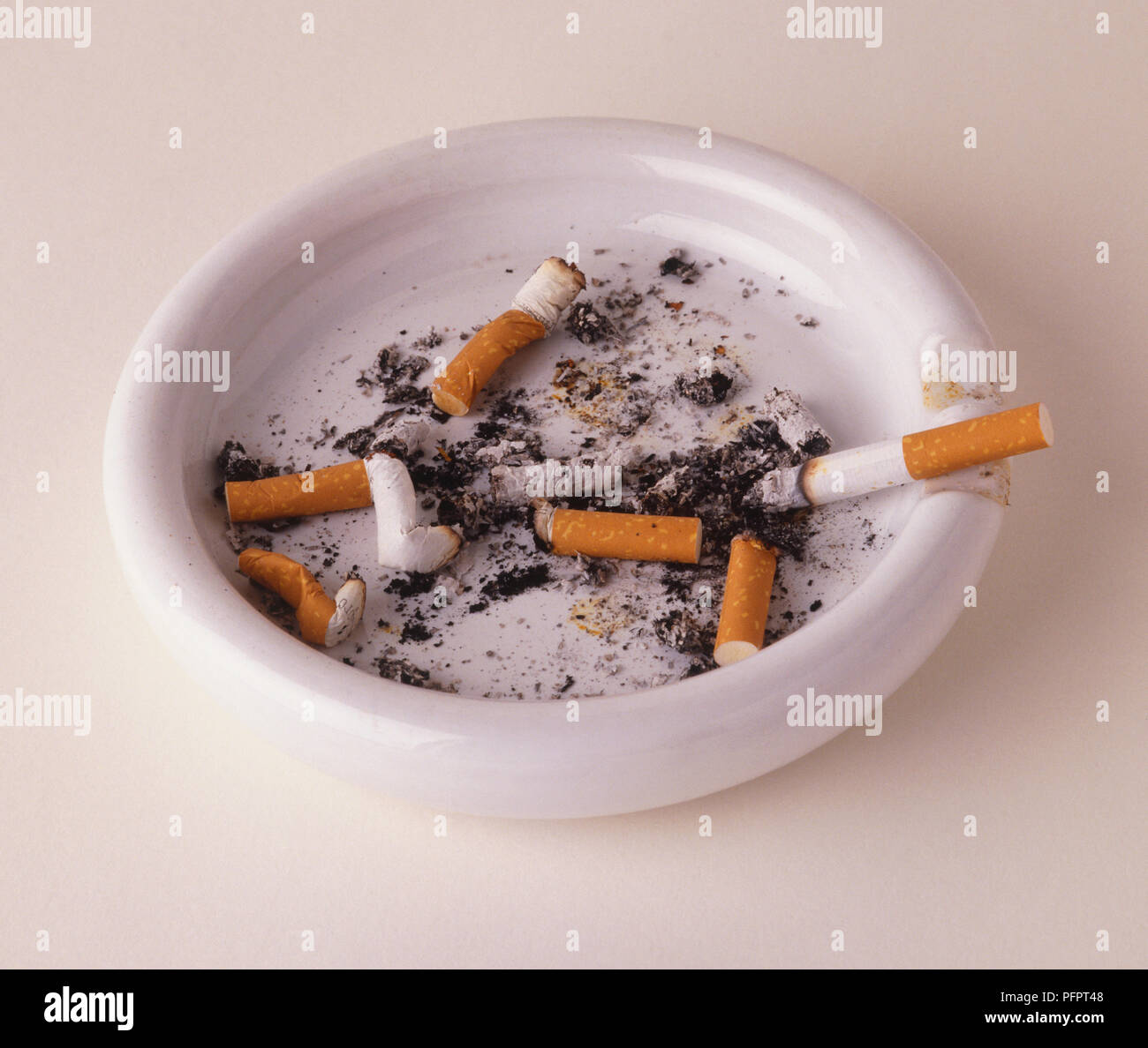 Ashtray With Lit Cigarette