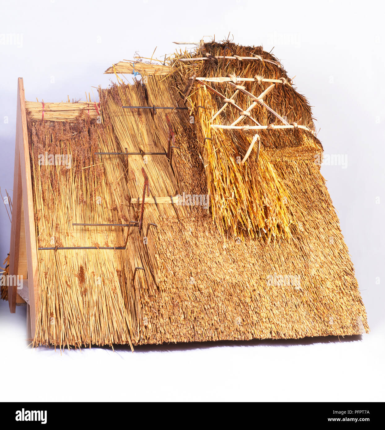 Building a thatched roof, model Stock Photo - Alamy