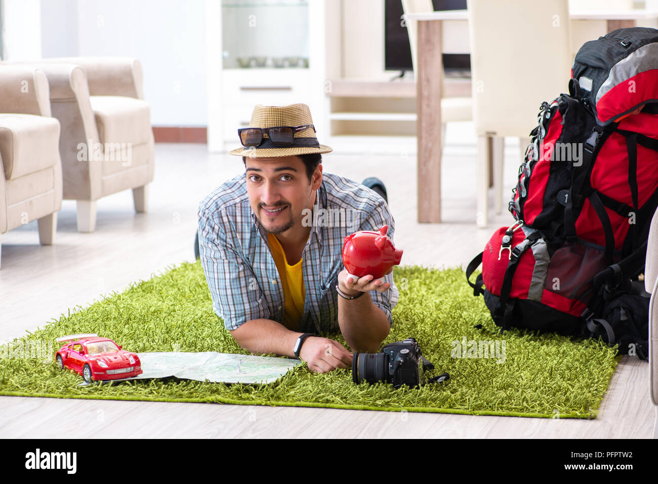 Man planning his travel with map Stock Photo - Alamy