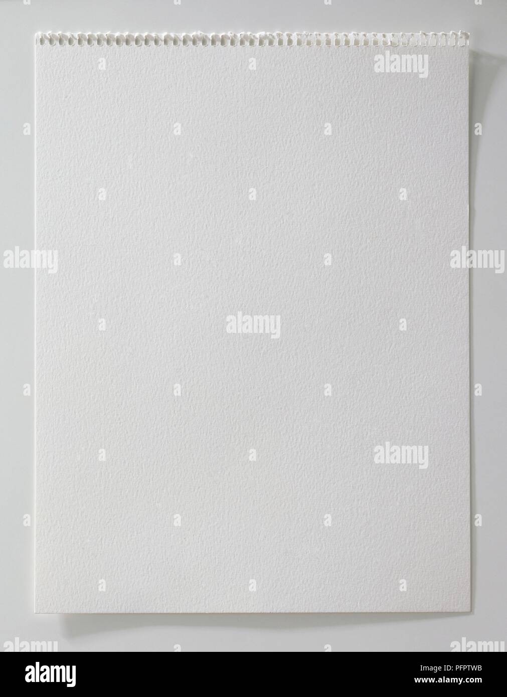 Blank white page torn from a spiral notepad Stock Photo - Alamy