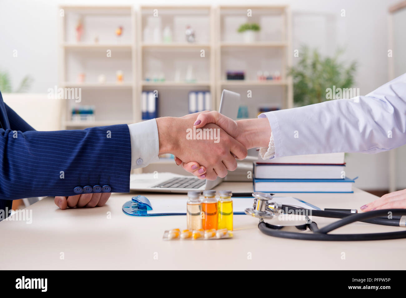 Man visiting doctor for routine check-up Stock Photo - Alamy