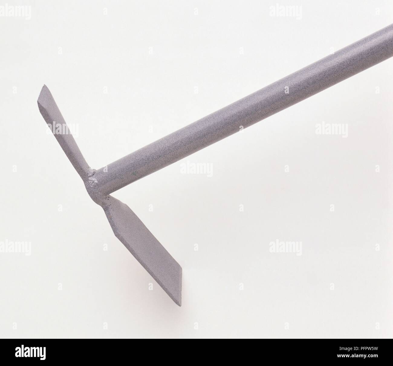 Metal digging hoe Stock Photo - Alamy