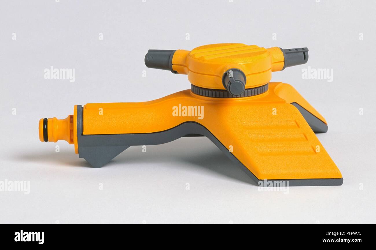 Rotating water sprinkler Stock Photo - Alamy