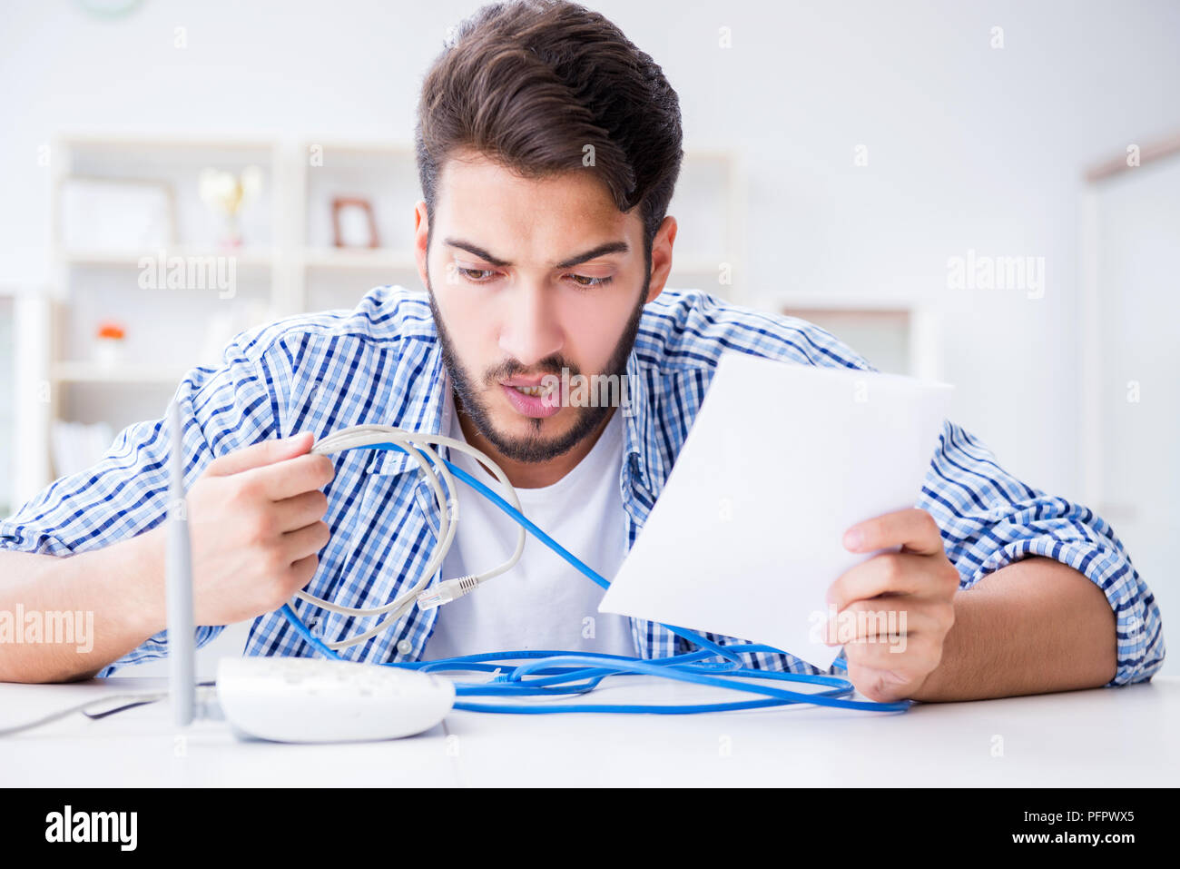 Frustrated computer manual hi-res stock photography and images - Alamy