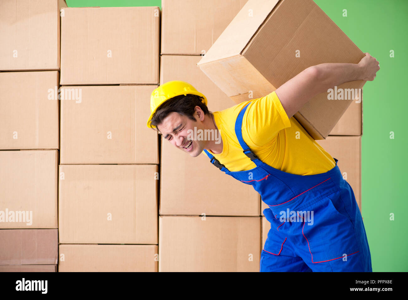 Man contractor working with boxes delivery Stock Photo - Alamy
