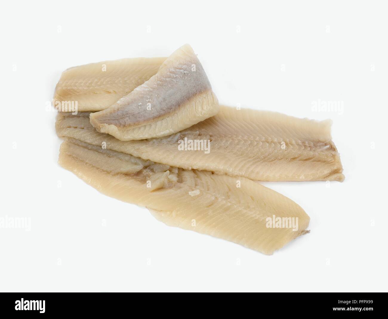 Three smoked herring fillets Stock Photo - Alamy
