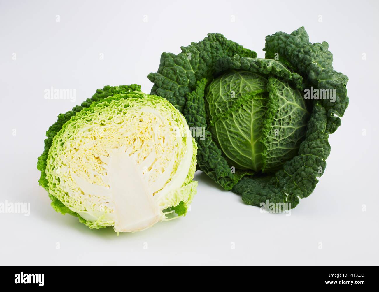 Savoy cabbage, whole and cut in half Stock Photo - Alamy