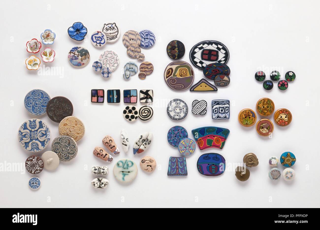 Ornate buttons of various shapes and sizes Stock Photo - Alamy