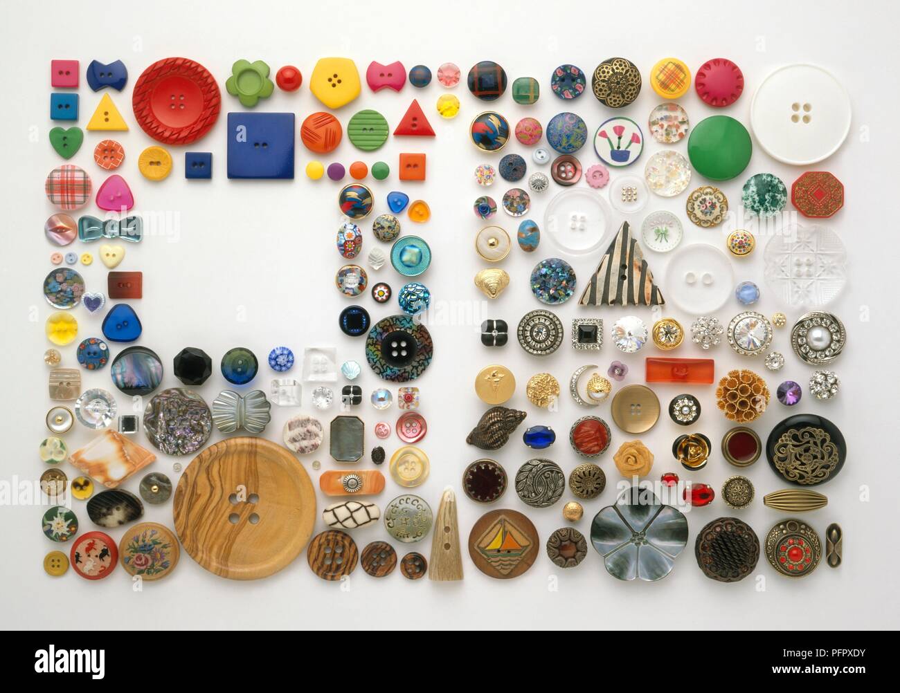 Ornate buttons of various shapes and sizes Stock Photo - Alamy
