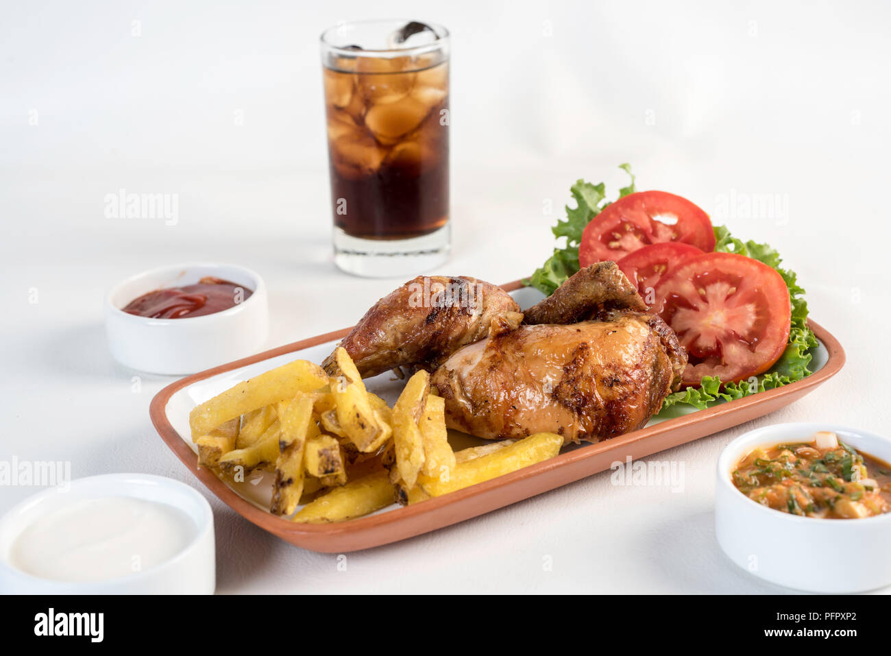 Peruvian food: Pollo a la brasa. Roast chicken Stock Photo - Alamy