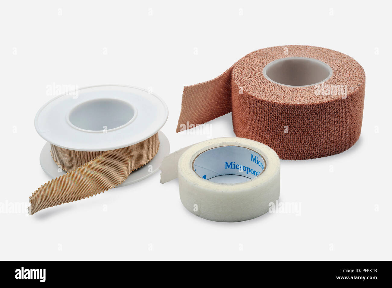 Assorted bandages and plaster, close-up Stock Photo - Alamy