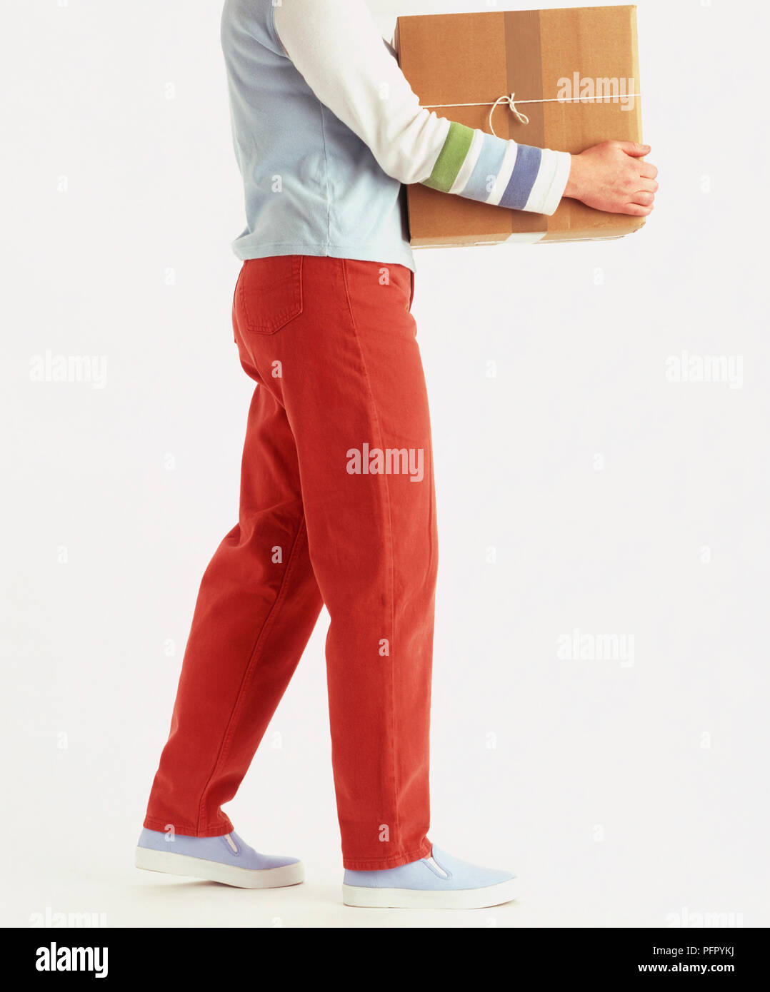 Man carrying cardboard box Stock Photo - Alamy