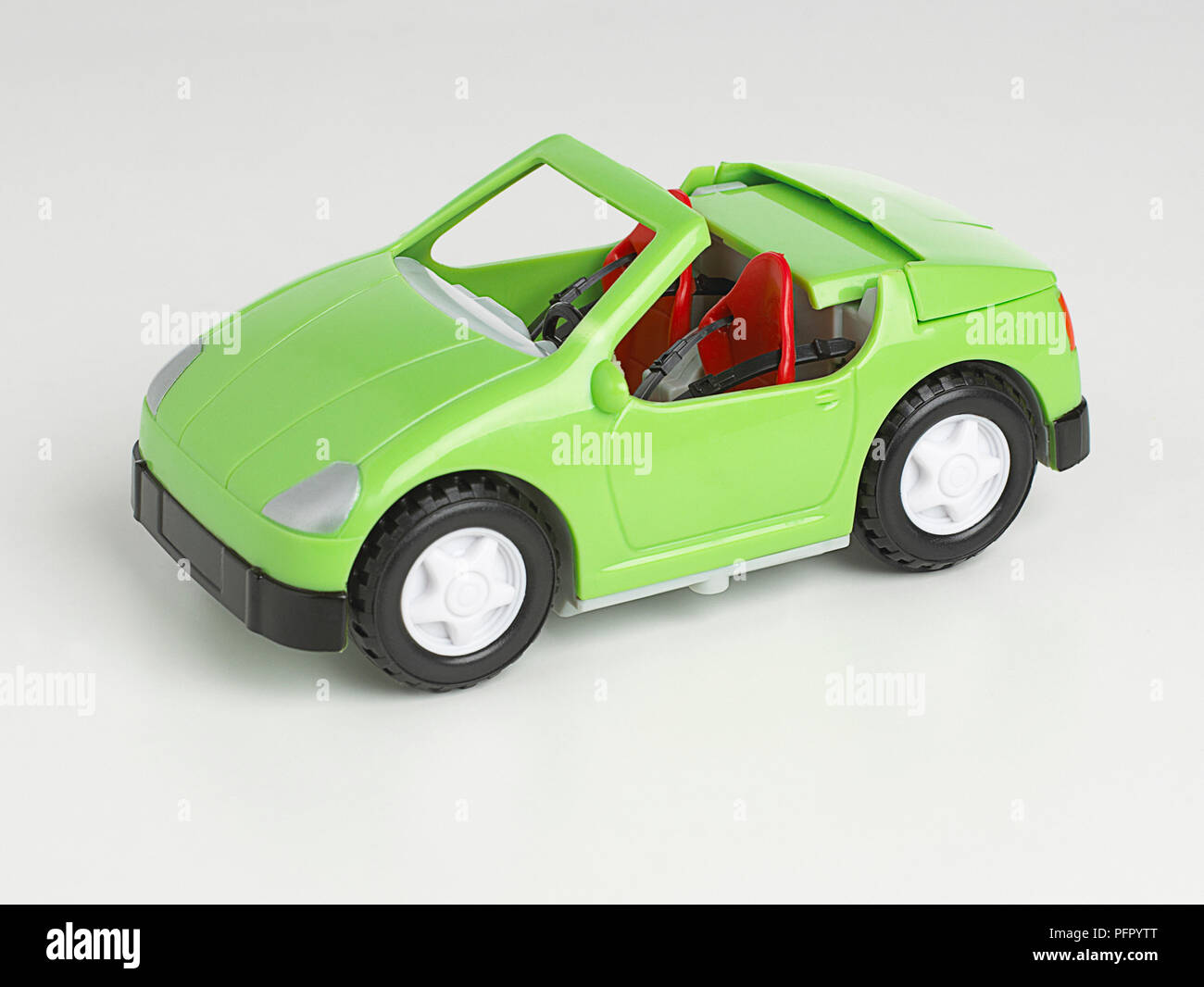 Green plastic toy car Stock Photo - Alamy