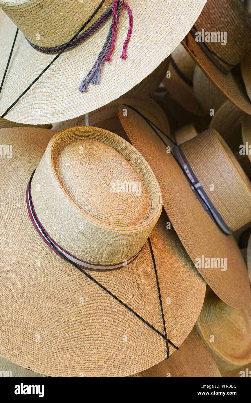 Chile, Biobio region, Chillan city, straw hats for sale at market ...