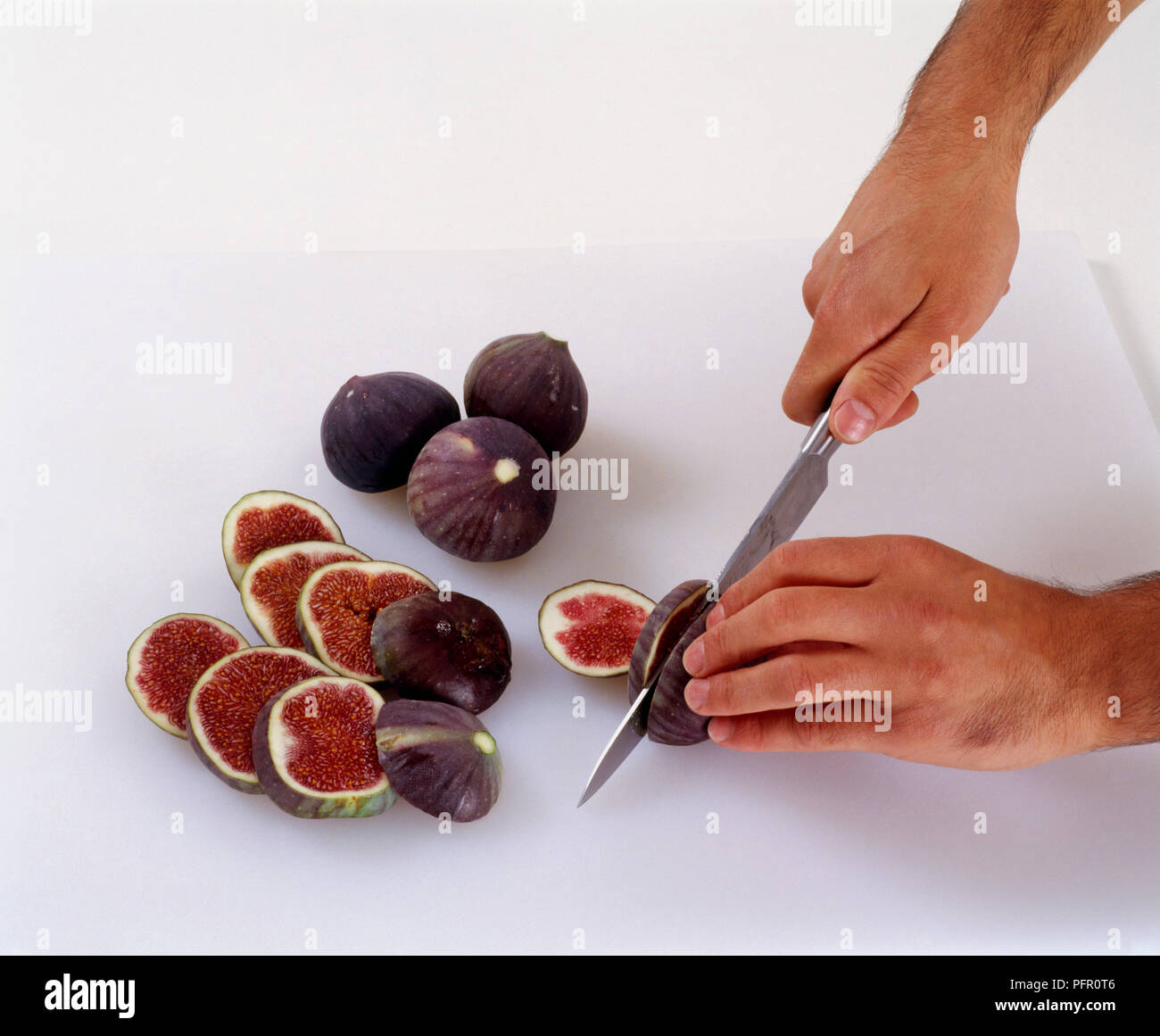 Chefs knife cutting fruit hi-res stock photography and images - Alamy