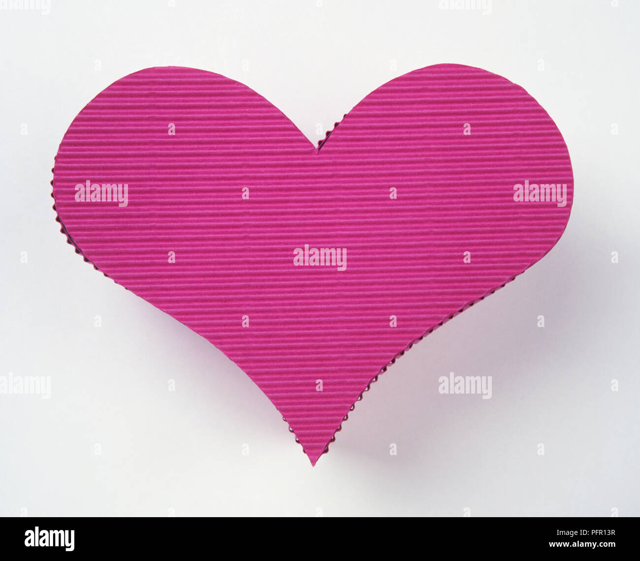 Pink corrugated cardboard heart Stock Photo - Alamy