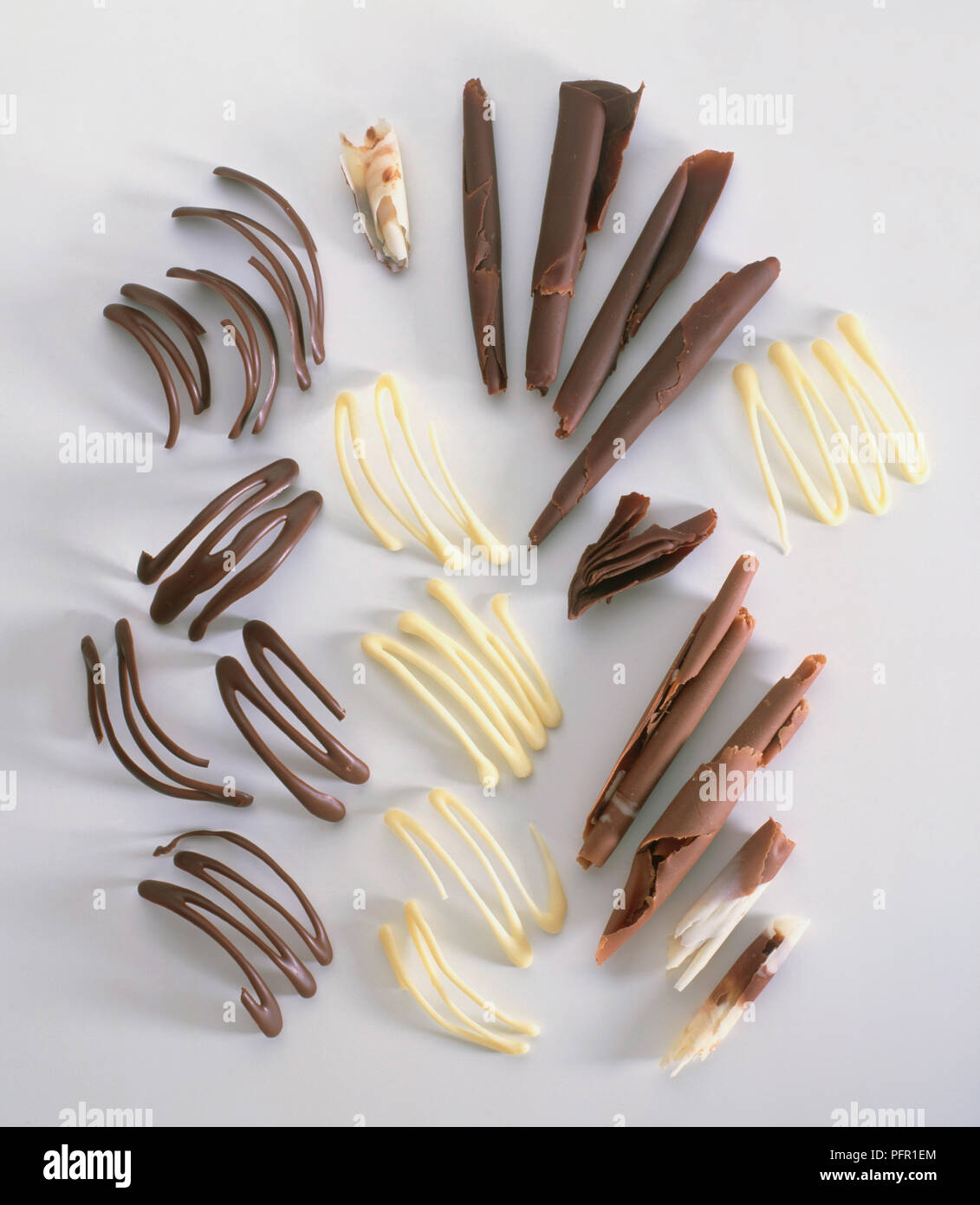 Piped chocolate curves Stock Photo - Alamy