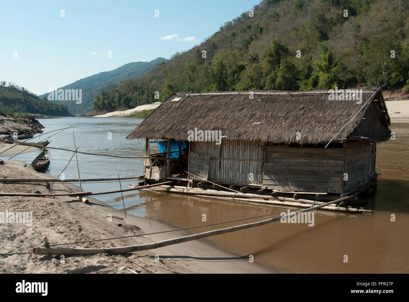 Laos, Northern Laos, Mekong River, typical Lao Loum fishing shack at ...