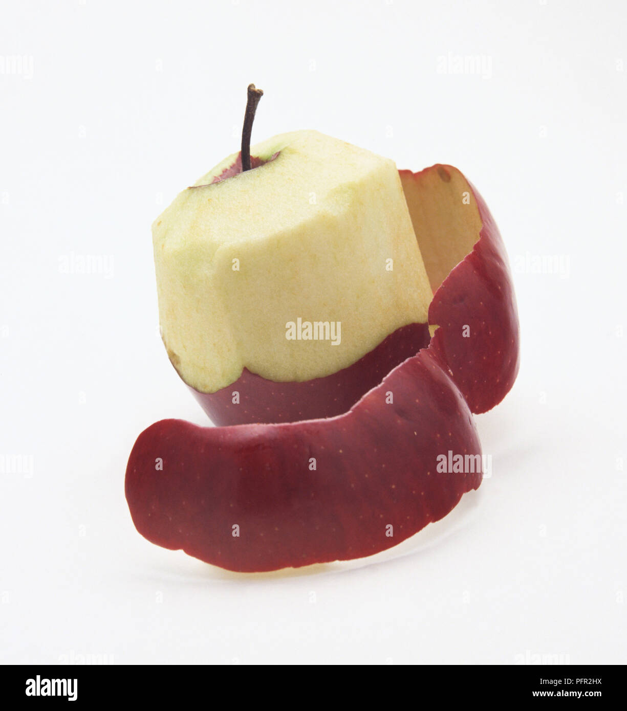 Half peeled red apple Stock Photo - Alamy