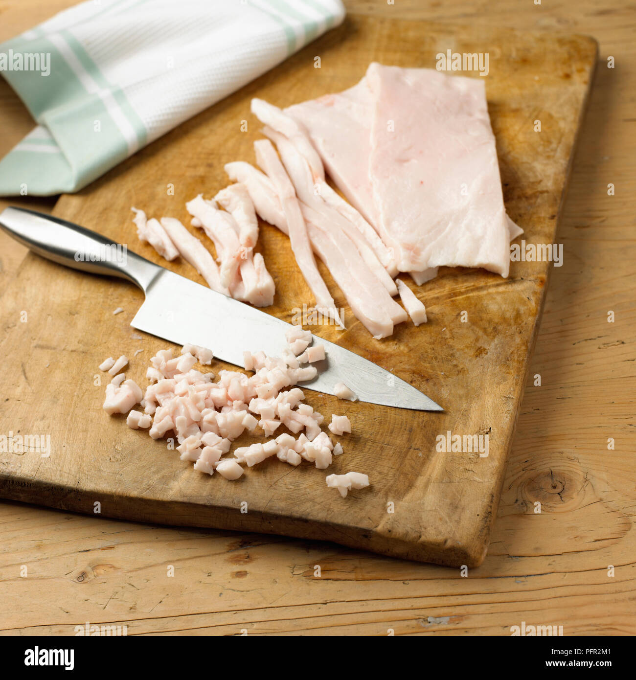 Strips and chopped pork back fat for cold cut sausage on wooden ...