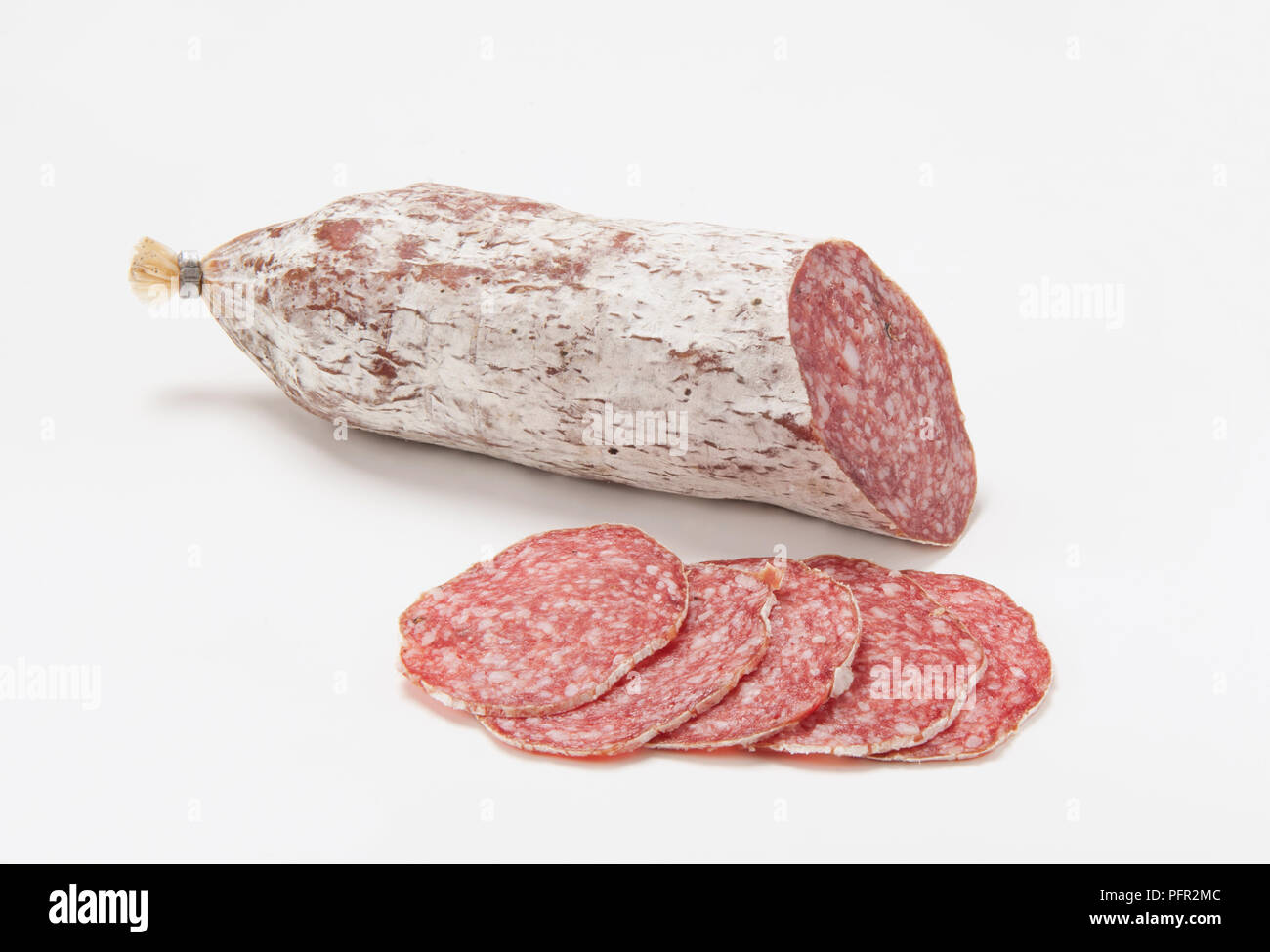 Whole and sliced Italian Salame di Varzi Stock Photo - Alamy