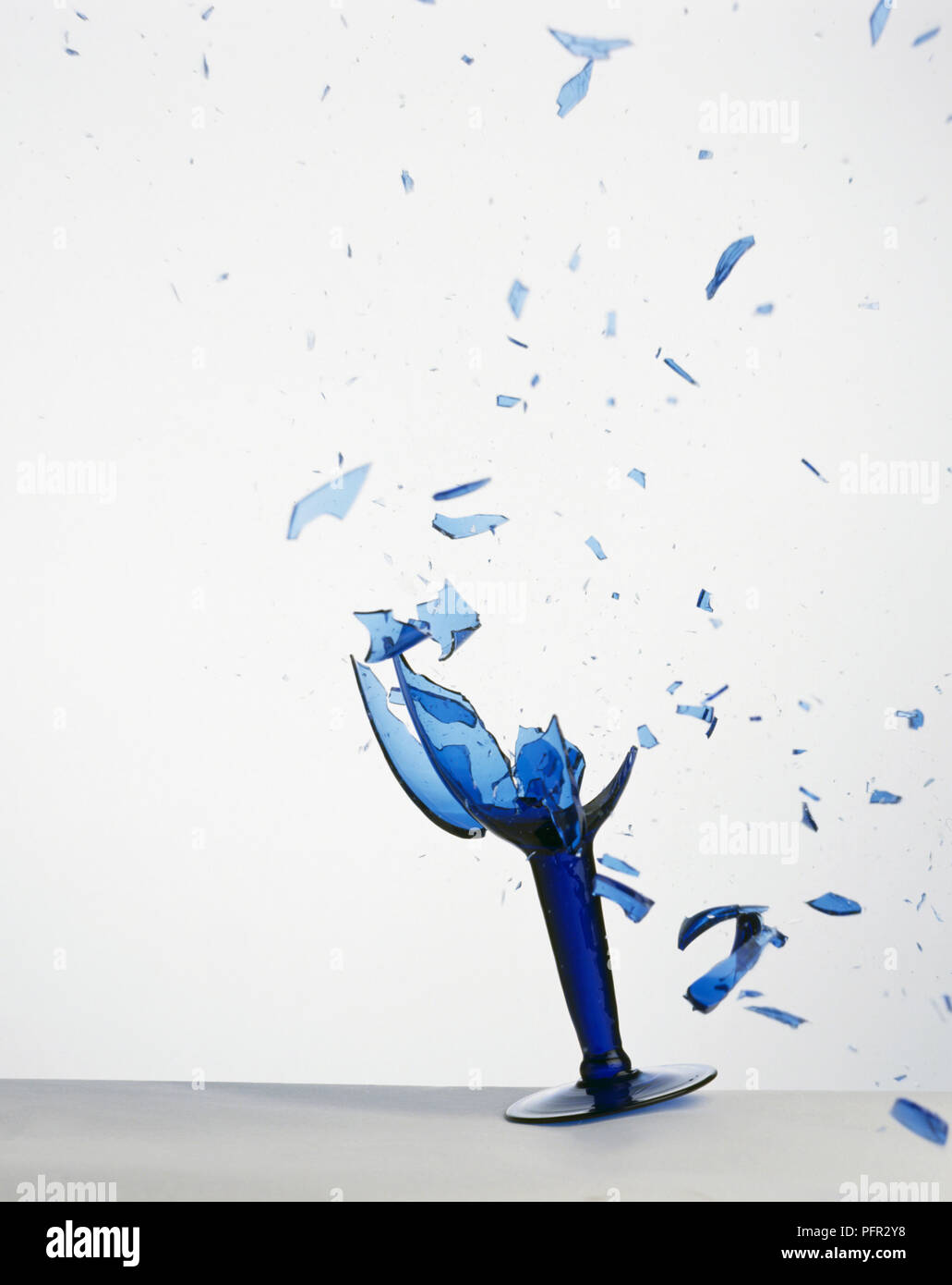 Wine glass smashed into pieces, splinters of glass flying around Stock ...