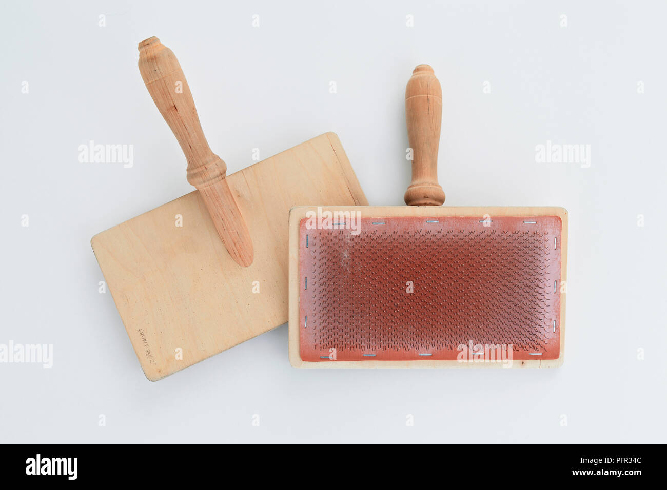 Hand carding hi-res stock photography and images - Alamy