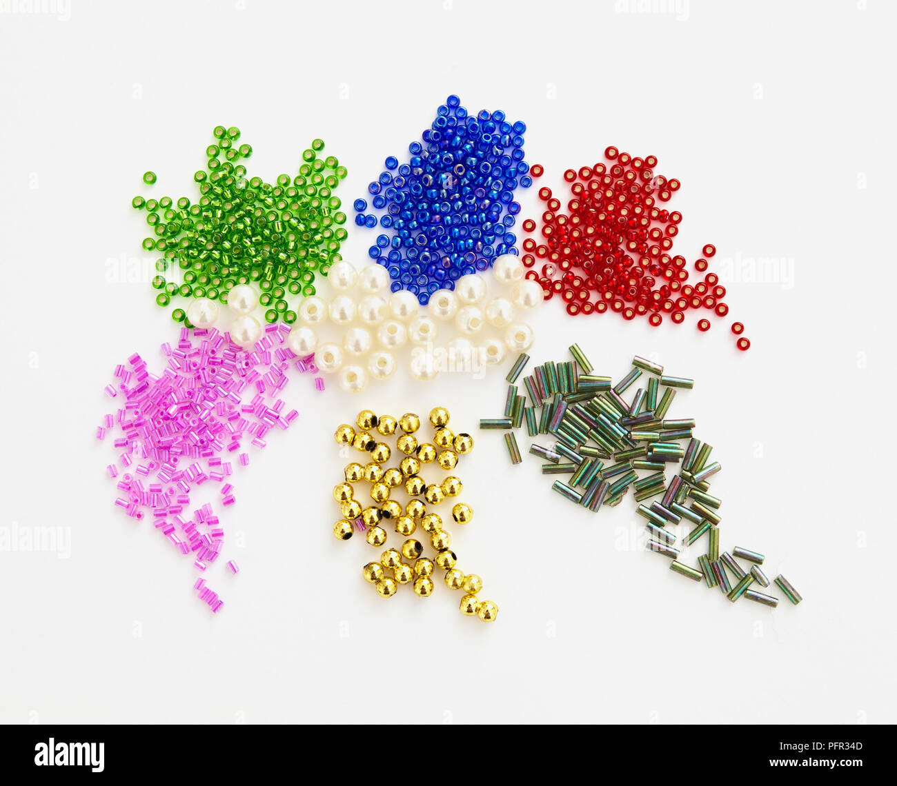 A selection of different coloured beads Stock Photo - Alamy